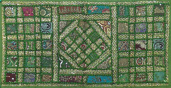 Green Cloth Enhanced with Zari,