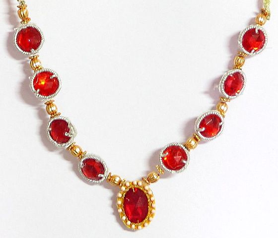 Red Stone Studded and Saffron Bead Small Garland for Deity