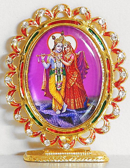 Radha Krishna in a Decorative Stone Studded Metal frame