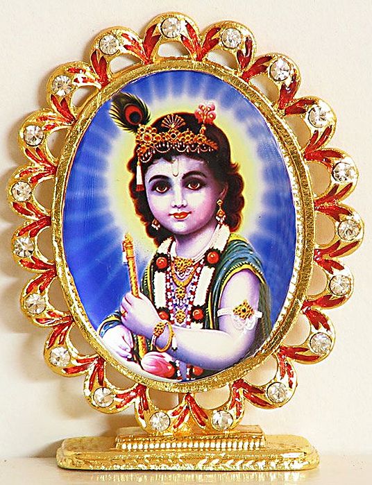 Young Krishna in a Decorative Stone Studded Metal frame